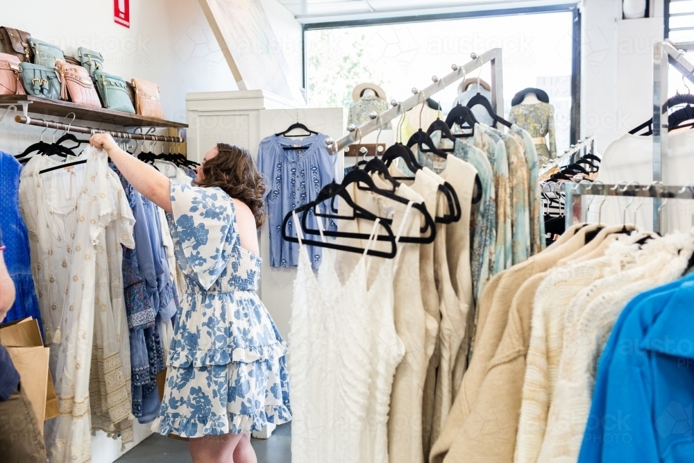 Image of Happy young lady with down syndrome shopping in dress and ...