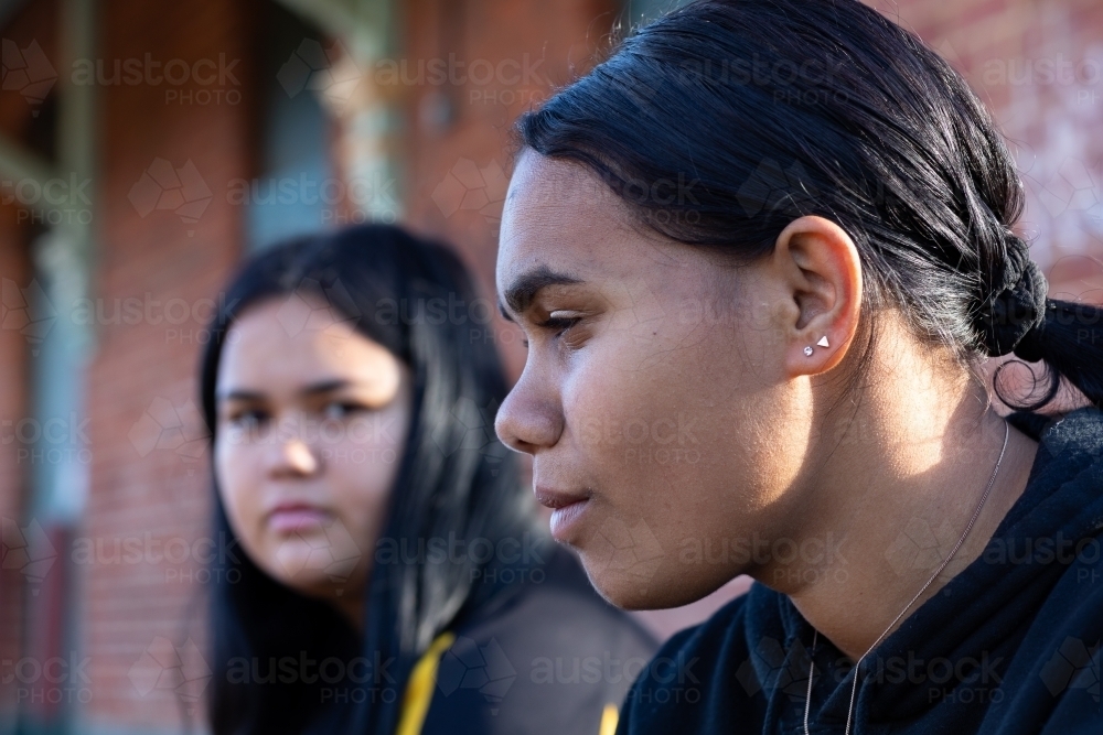 Image of head and shoulders of two aboriginal girls with one in profile ...