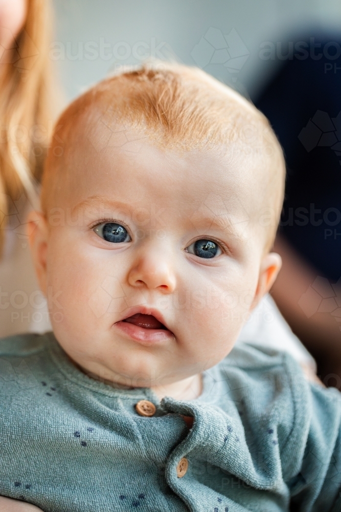 Image of headshot portrait of five month old baby girl - Austockphoto