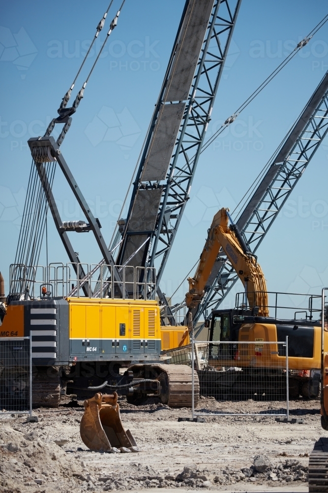 Image of Heavy machinery at construction site - Austockphoto