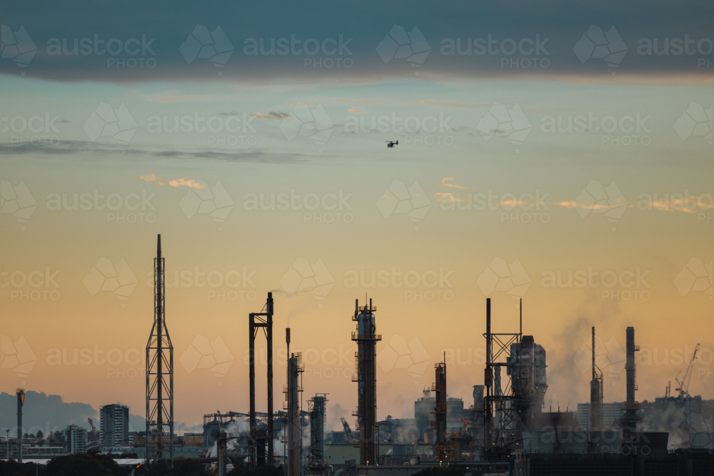Image of Helicopter flying over Newcastle port industrial area ...