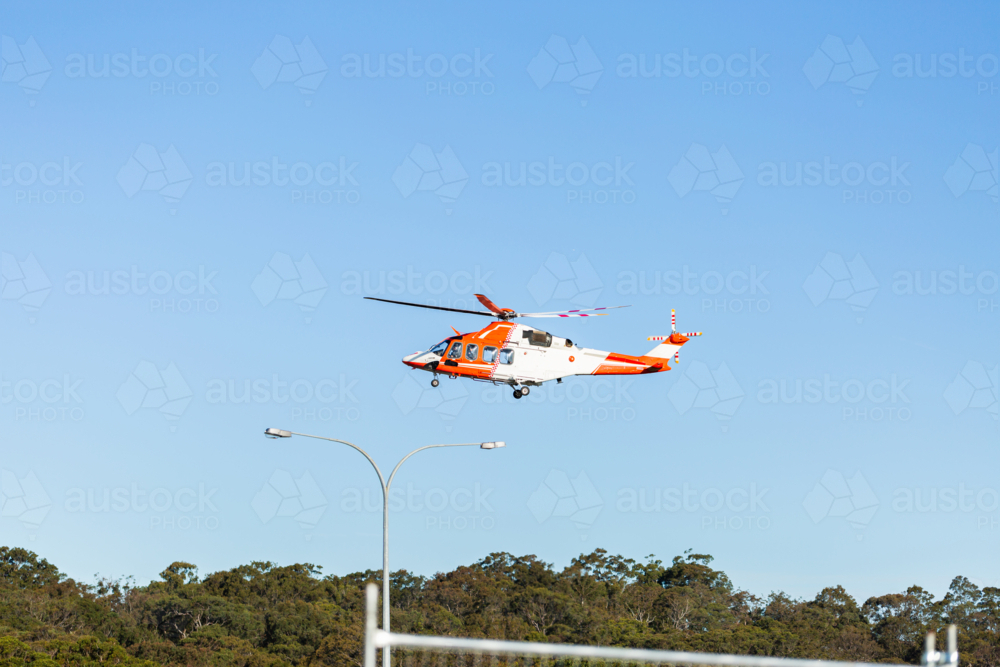 Image of Helicopter taking off from John Hunter Hospital - Austockphoto