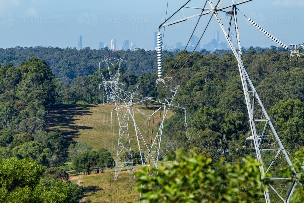 Image of High voltage electricity power lines and power poles with ...