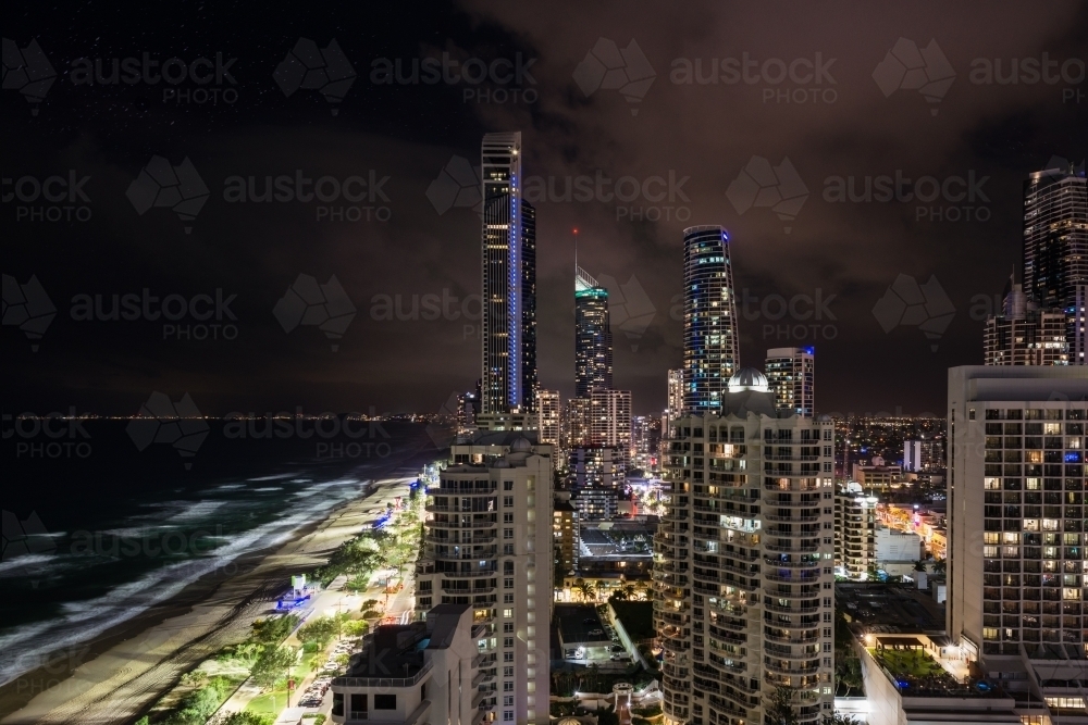 Image of highrises at night - Austockphoto