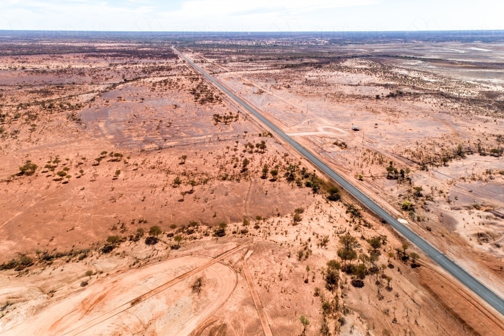 Image of Highway cuts through western Queensland in drought. - Austockphoto