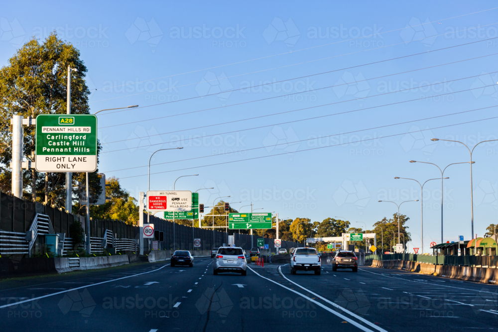 Image of Highway in Sydney with many road signs towards north connex ...