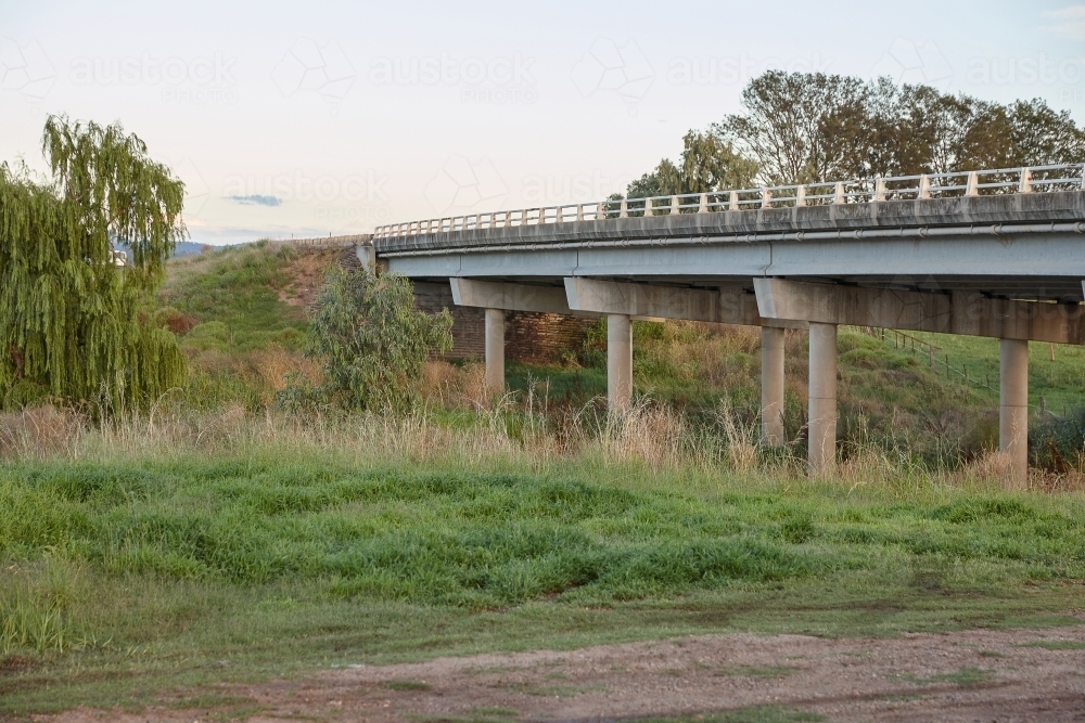 Image of Highway overpass over river - Austockphoto