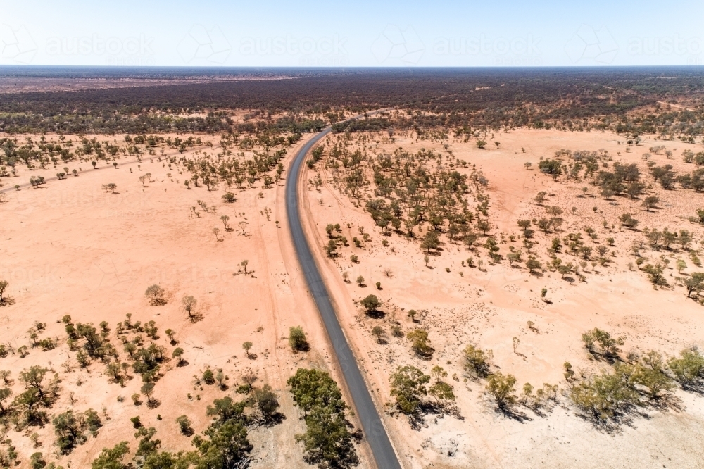 Image of Highway through drought in western Queensland. - Austockphoto