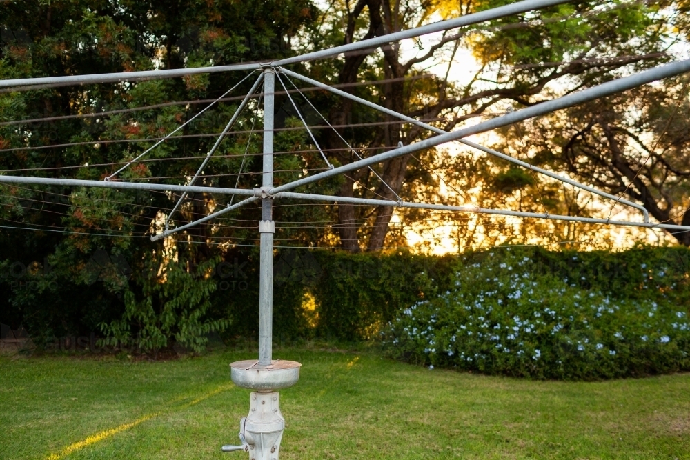 Image of Hills Hoist washing line on neat lawn grass on autumn ...