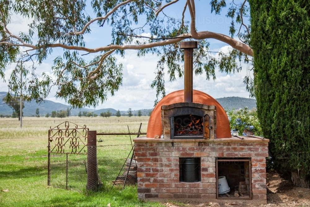 Image of Home built pizza oven on farm - Austockphoto