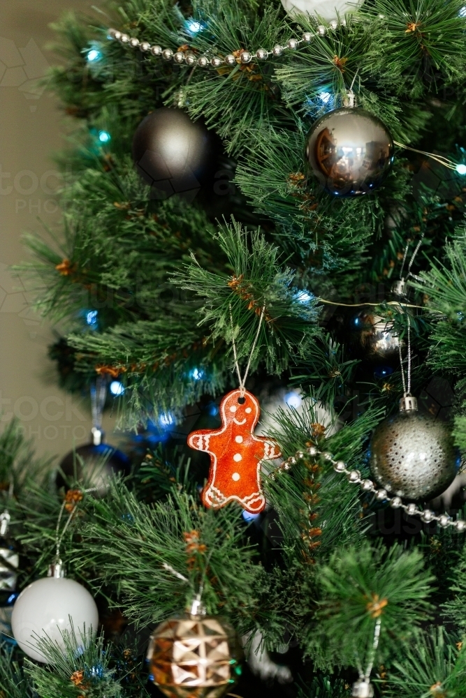 Image of Homemade ceramic ginger bread man hanging on Christmas tree ...