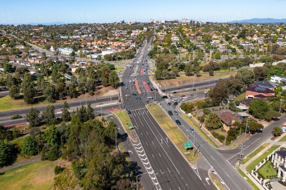 Image of Horizontal aerial view of a freeway overpass with traffic ...