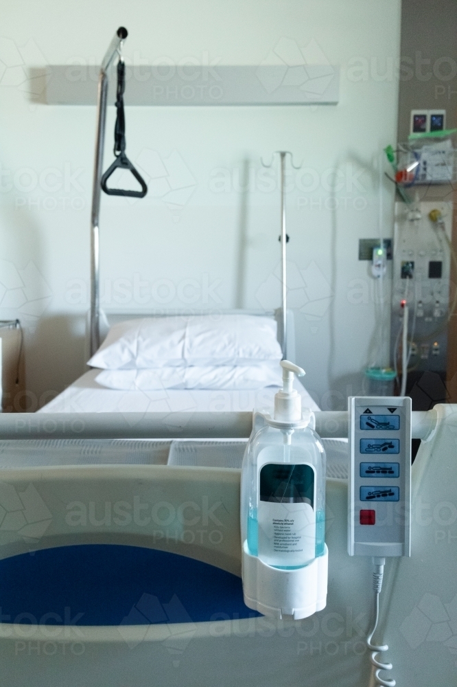 Image of Hospital bed with disability aid and antiseptic hand wash ...