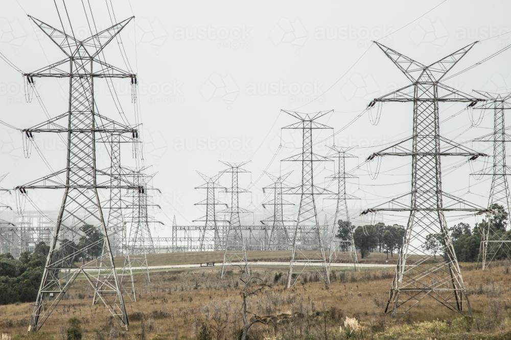 Image of Huge metal power pole structures holding the overhead power ...