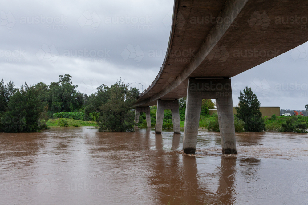 Image of Hunter River rising filling with brown floodwater during ...