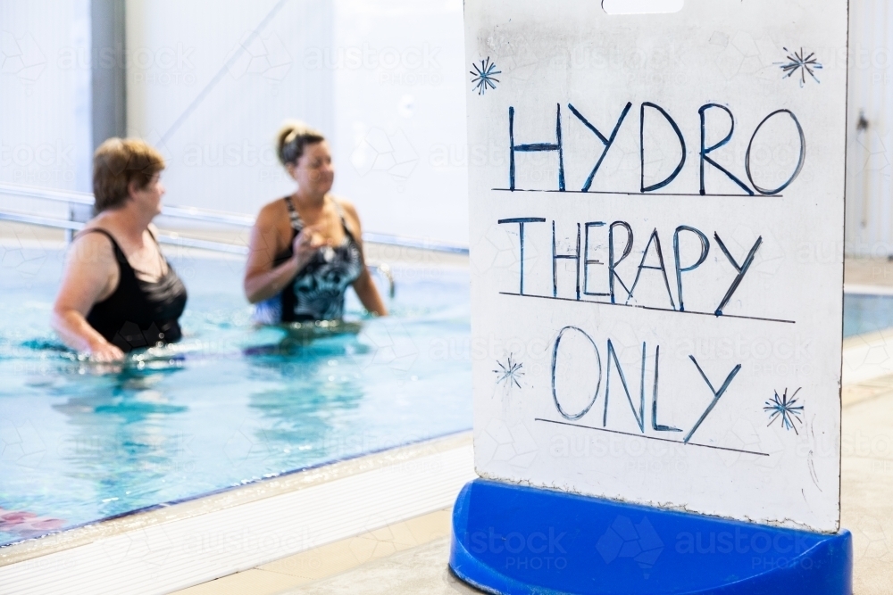 Image of Hydrotherapy only sign at local pool - Austockphoto