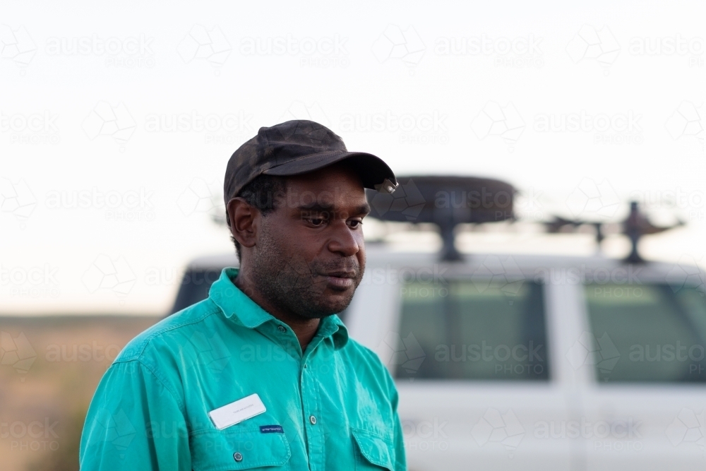 Image of Indigenous tour guide in the outback - Austockphoto