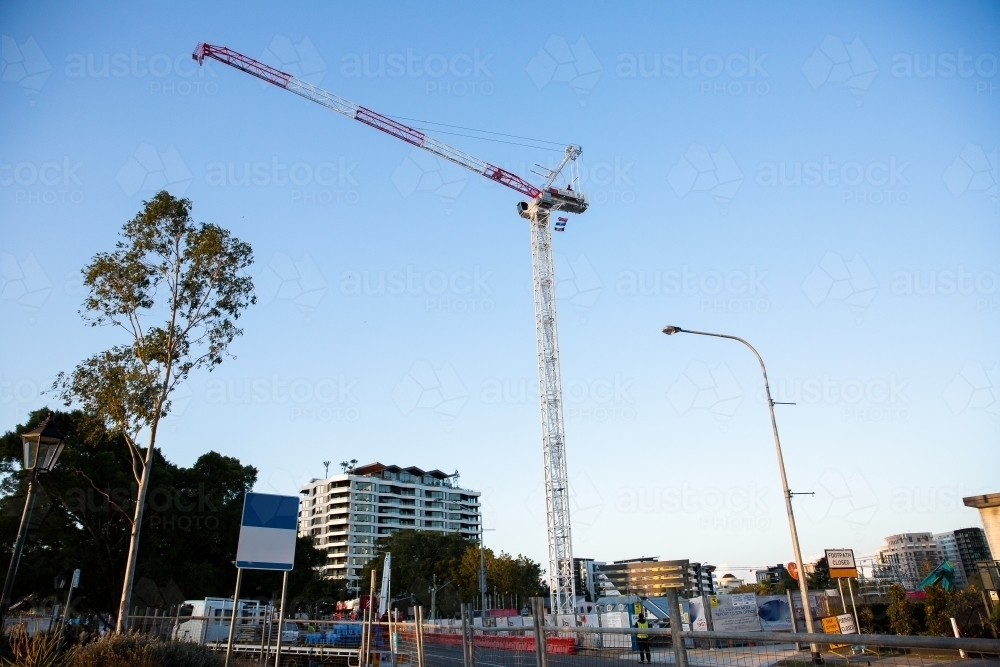 Image of inner city building site with crane - Austockphoto