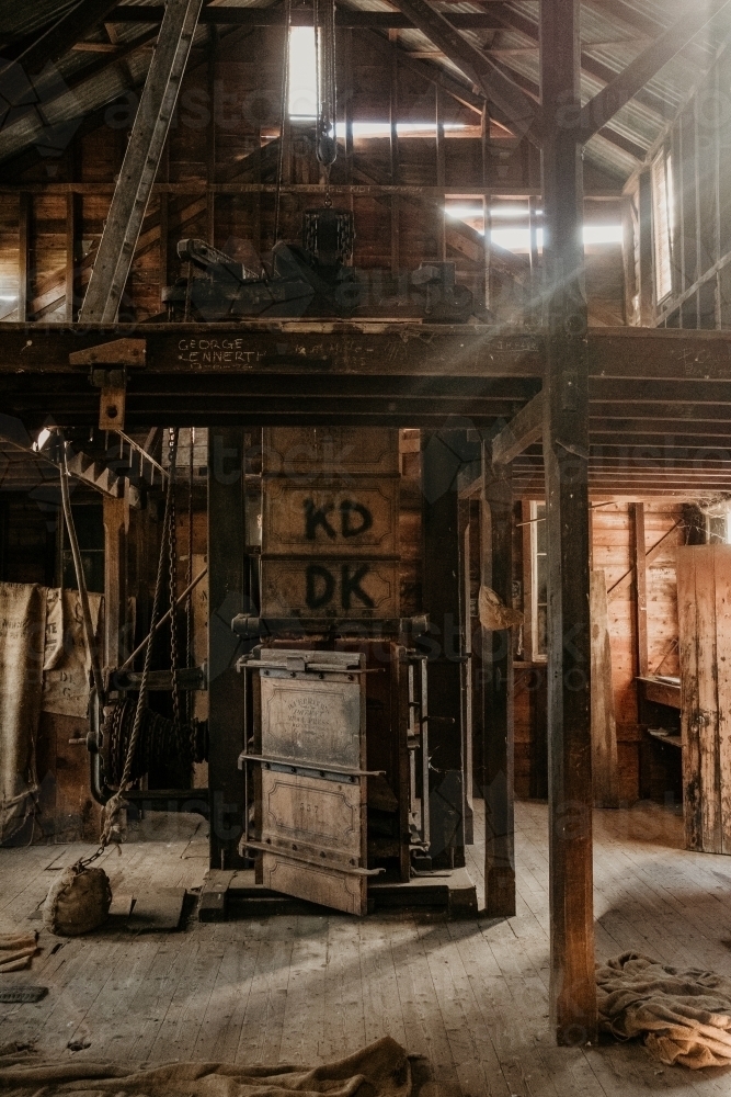 Image of Inside shearing shed with rays of sunlight. - Austockphoto