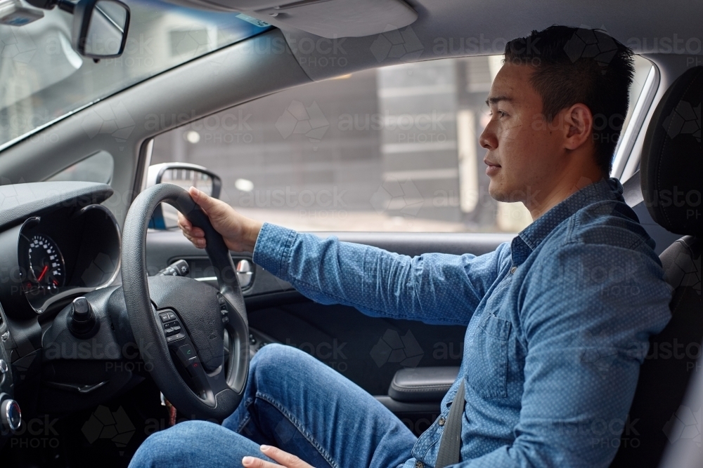 Image of Interior of man driving car - Austockphoto