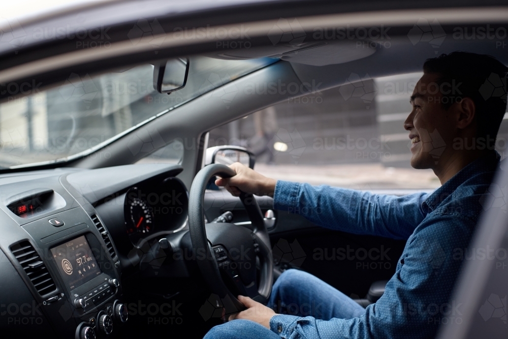 Image of Interior of man driving car - Austockphoto