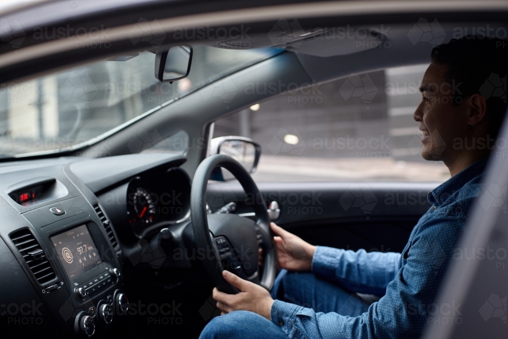 Image of Interior of man driving car - Austockphoto