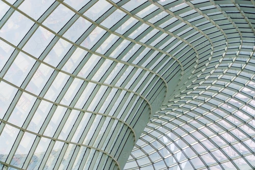 Image of Interior view of a curved ceiling of glass windows - Austockphoto