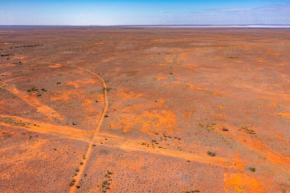 Image of intersecting lines of outback tracks in barren landscape with ...