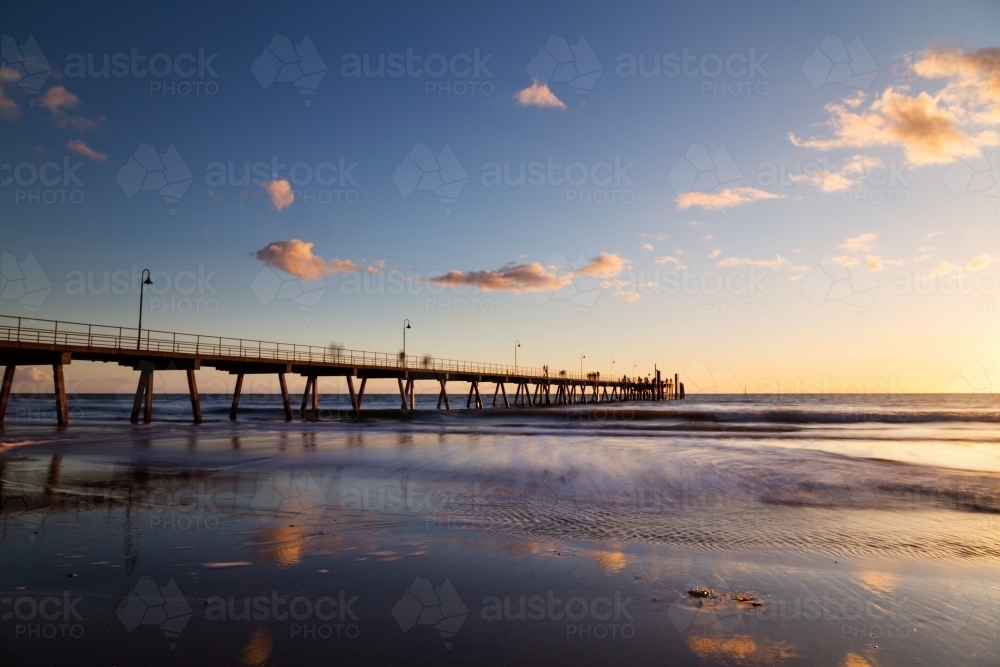 Image of jetty at sunset - Austockphoto