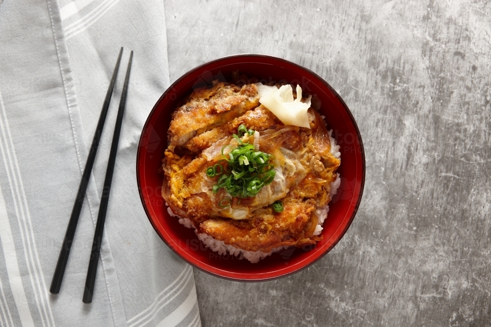Image of Katsu don dish on table - Austockphoto