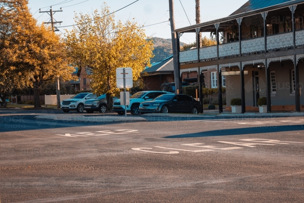Image of 'Keep Clear' written on street at intersection - Austockphoto