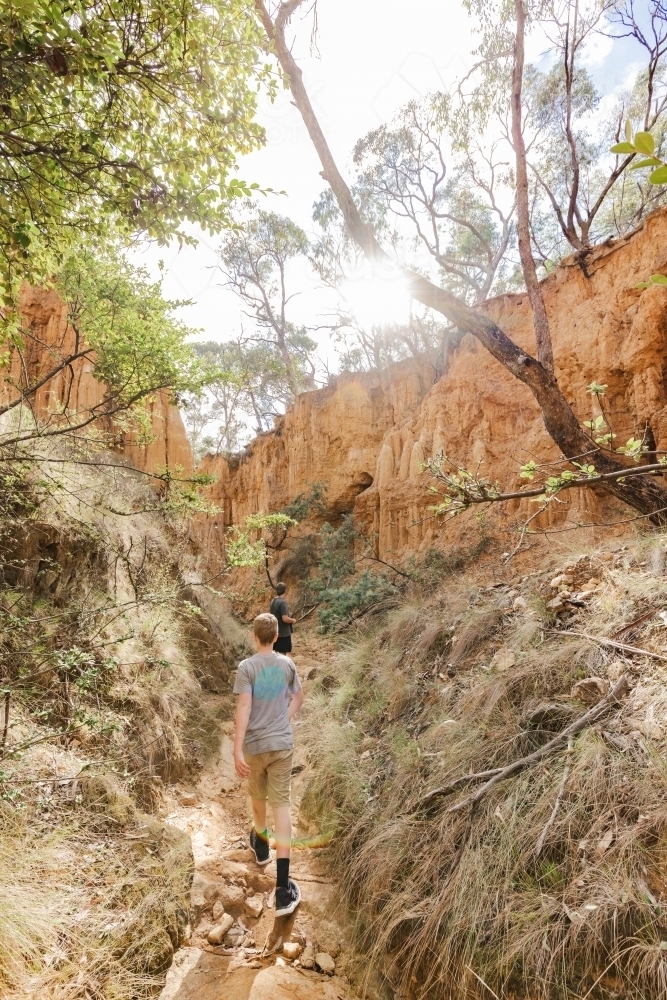 Image of Kids exploring Golden Gully near Hill End, NSW - Austockphoto