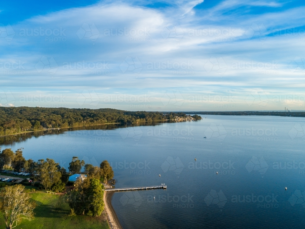 Image of Lake Mac Watersports with wharf and bouys in water seen from ...