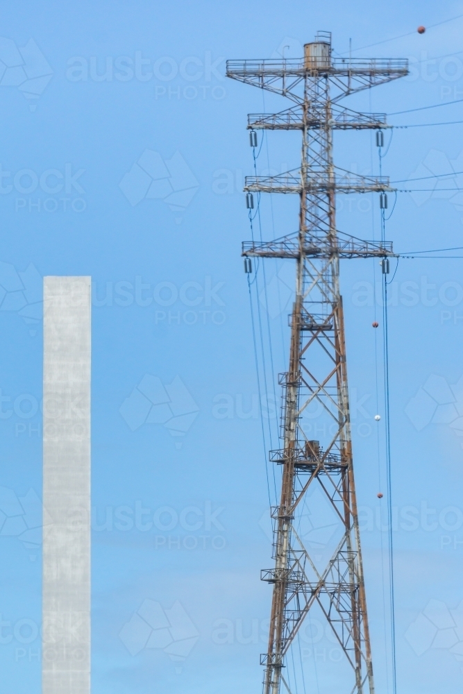 Image of Large electricity stanchions and power cables running over a ...