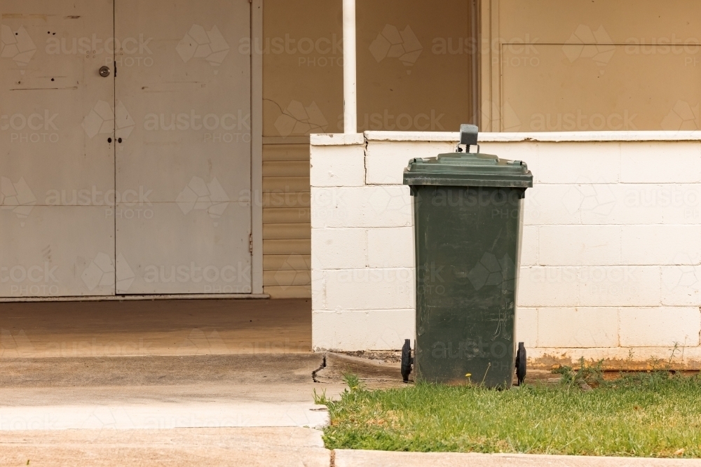 Image of Large green wheelie bin out the front of memorial hall in ...