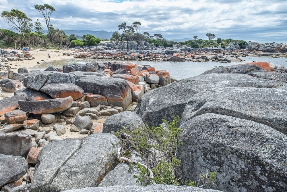 Image of Large rocks on beach - Austockphoto