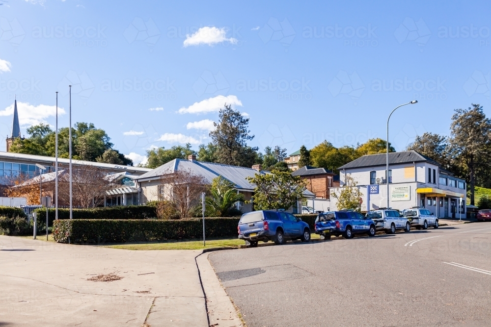 Image of Law enforcement vehicles parked beside police station in ...