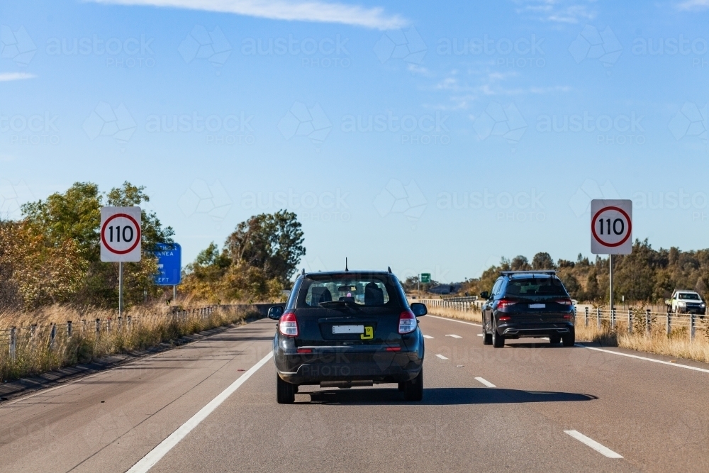 Image of Learner driver approaching 110 speed zone in holiday traffic ...