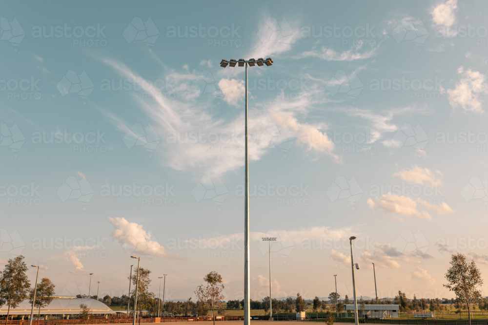 Image of light tower with blue sky background - Austockphoto