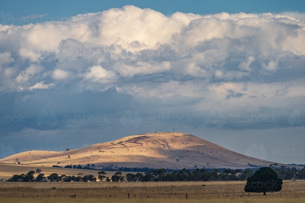 Image of Long distance view of a dark cloud bank approaching over ...