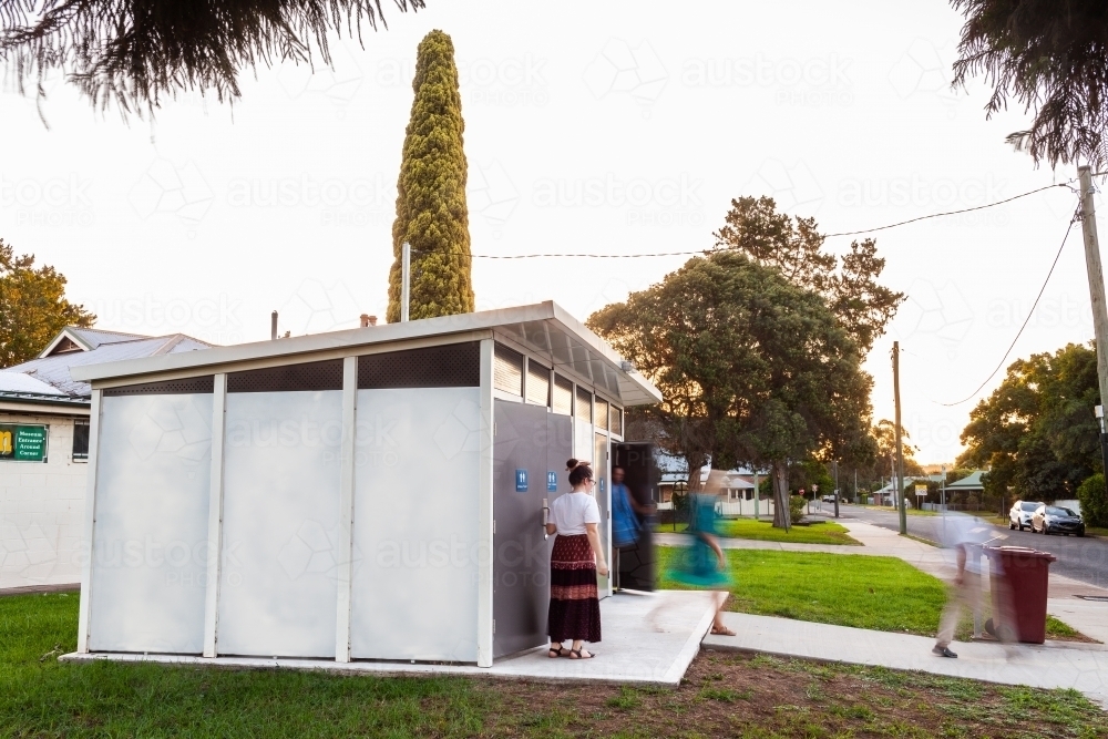Image of long exposure of public toilet block in park with blurred ...