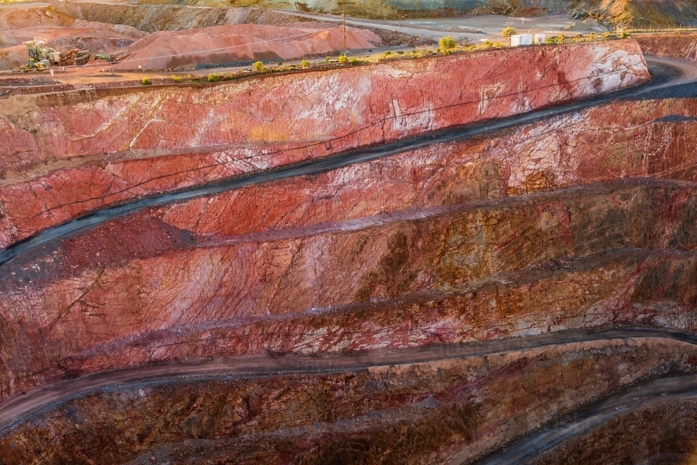 Image of Looking down into an open cut mine with roads winding down to ...