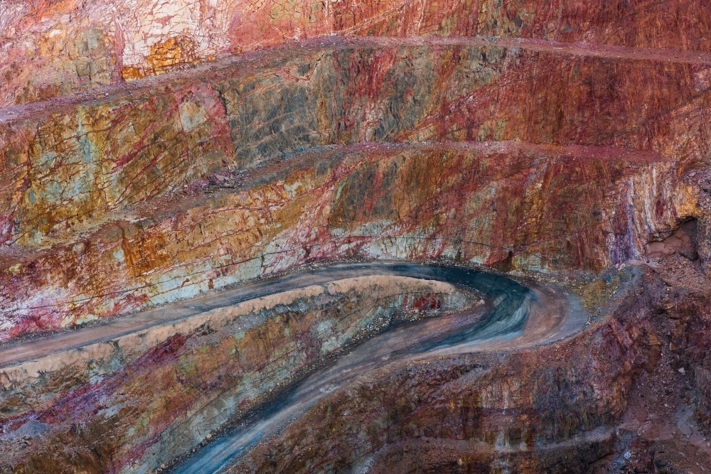 Image of Looking down into an open cut mine with roads winding down to ...