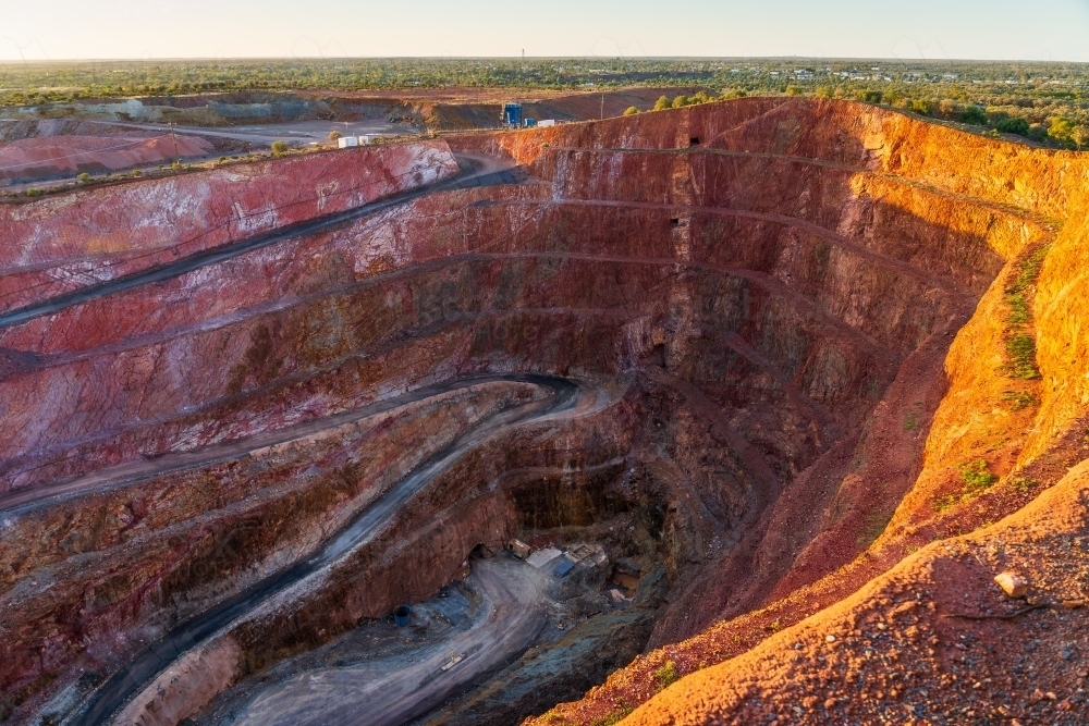Image of Looking down into an open cut mine with roads winding down to ...