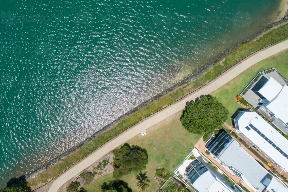 Image of Looking down on waterfront homes and water. - Austockphoto