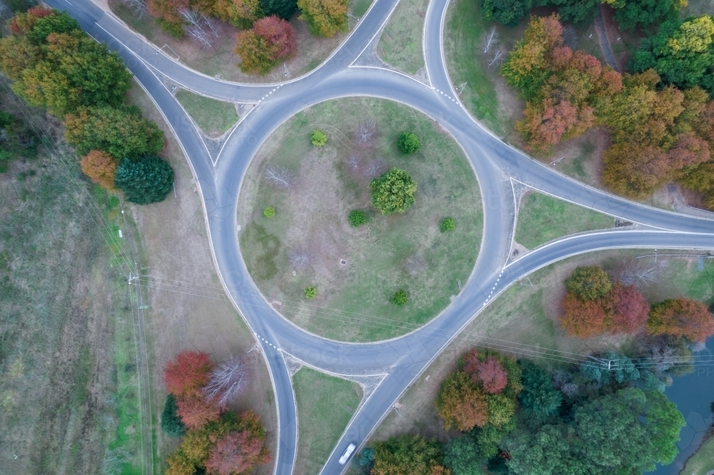 Image of Looking down over a roundabout in autumn - Austockphoto