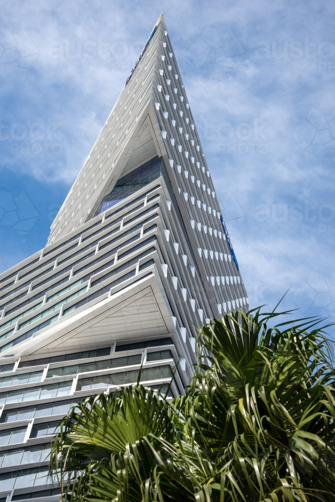 Image of Looking up at a modern sky-scraper building on a sunny day ...