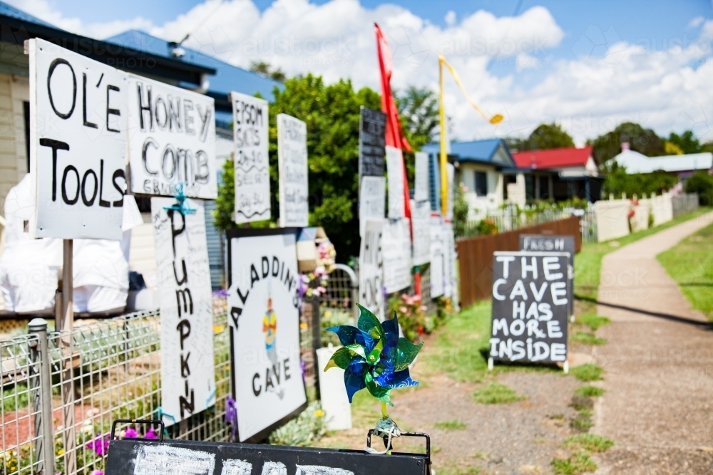 Image of Lots of hand written signs advertising things for sale outside ...