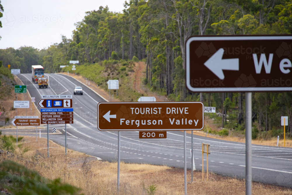 Image of Lots of road signs on tourist route near Collie - Austockphoto