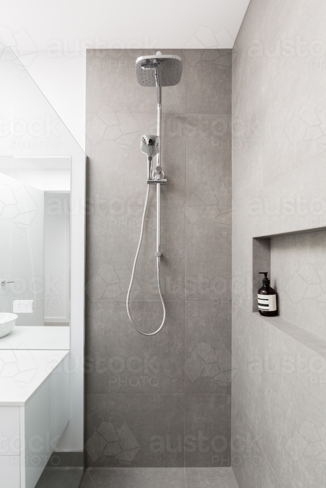 Image of Luxury fully tiled shower with rain head and hand held shower ...